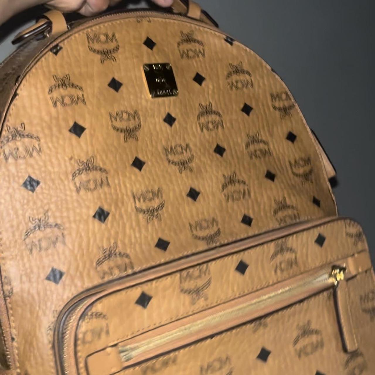 Tan and black MCM backpack #backpack - Depop