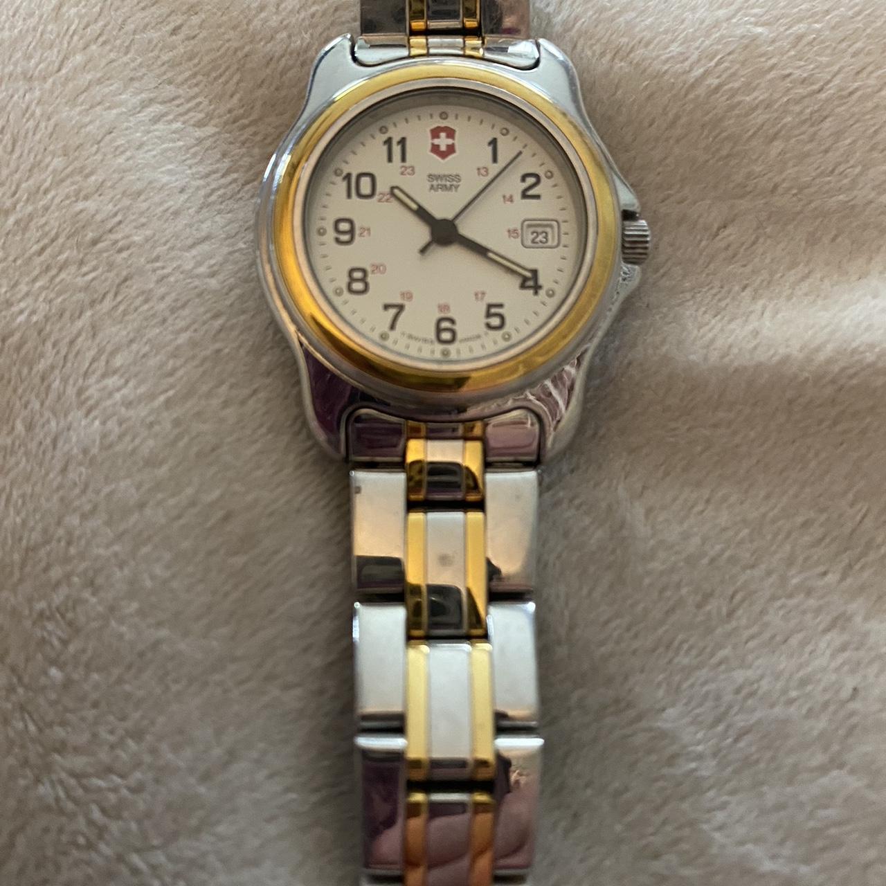 Women's Swiss Army Brand Victorinox watch. Gold and... - Depop