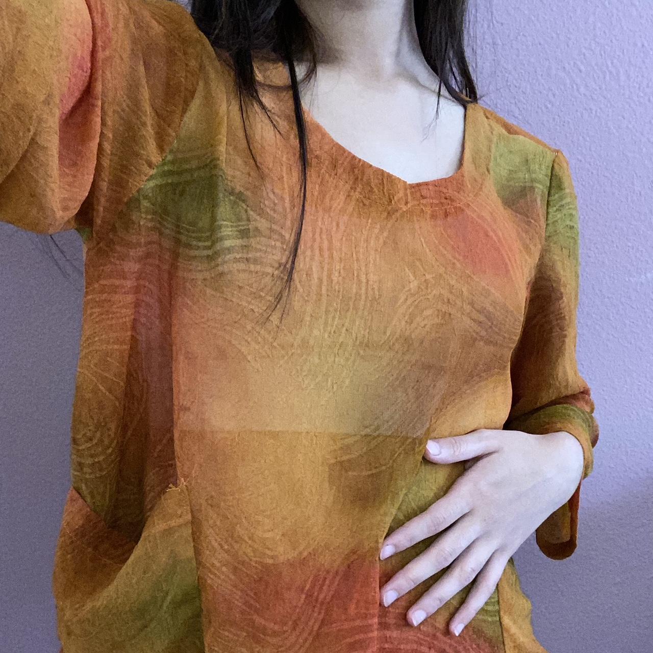 sheer oversized/loose top that can be styled in... - Depop