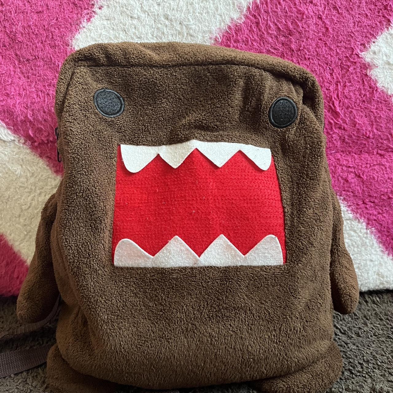 Brown and red Domo plush backpack I bought this when... - Depop