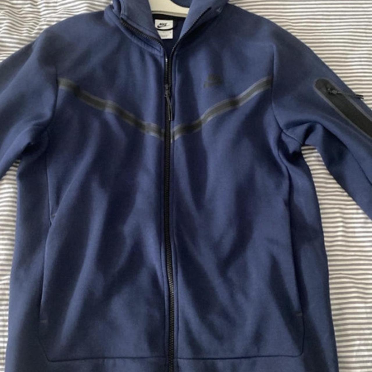 We are selling a Nike tech jacket in Blue, Size... - Depop