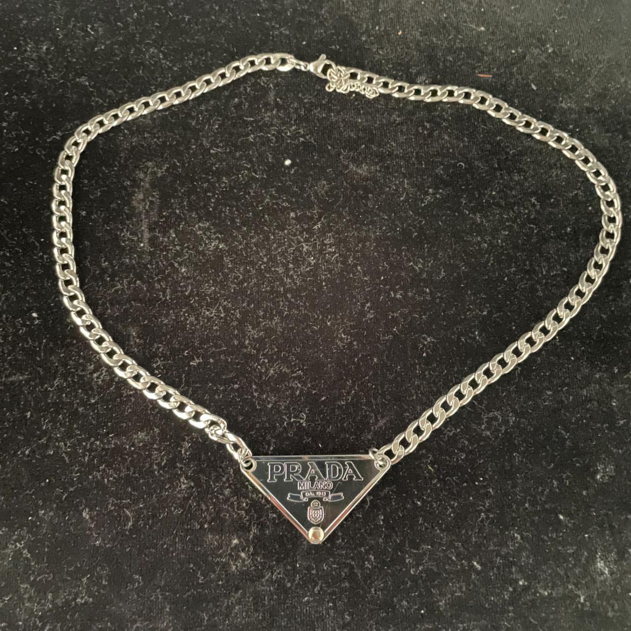 Black Prada trangle logo tag repurposed into custom... - Depop