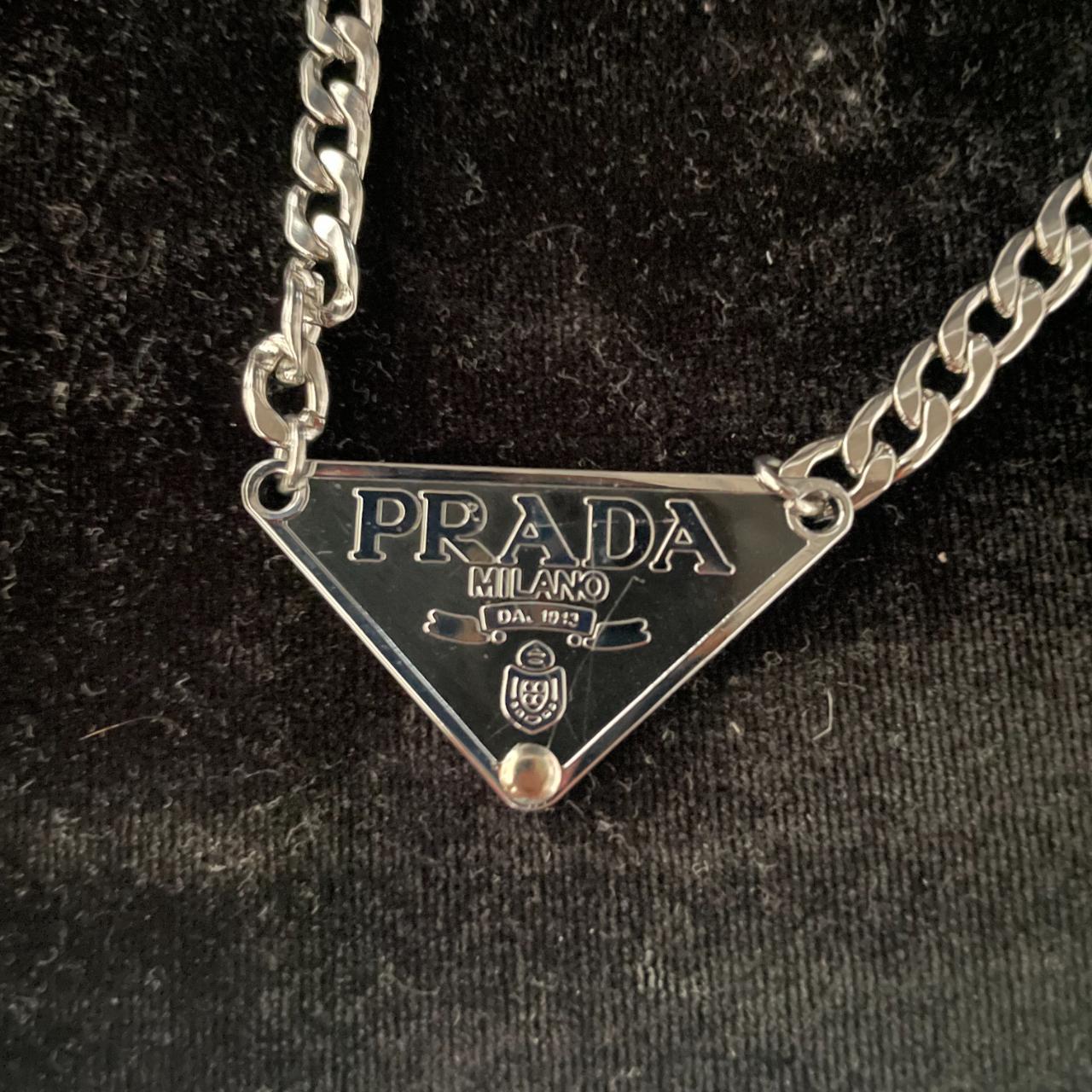Black Prada trangle logo tag repurposed into custom... - Depop