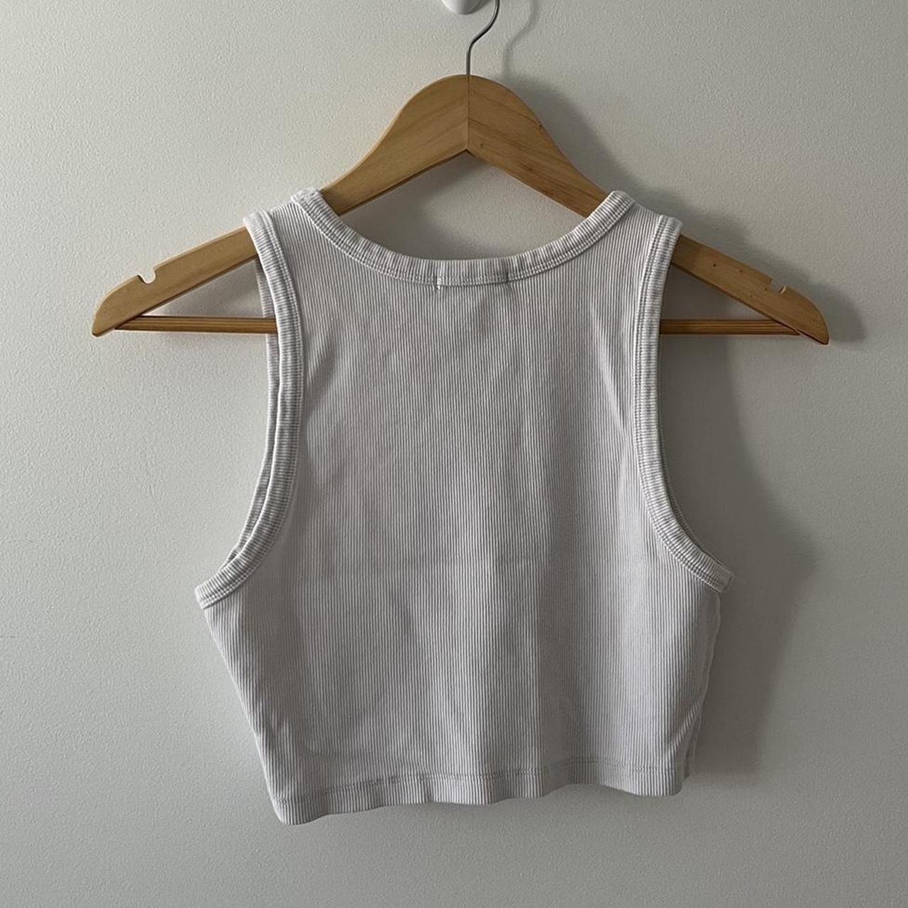 Cropped White Muscle Tank Size M stretchy and could... - Depop