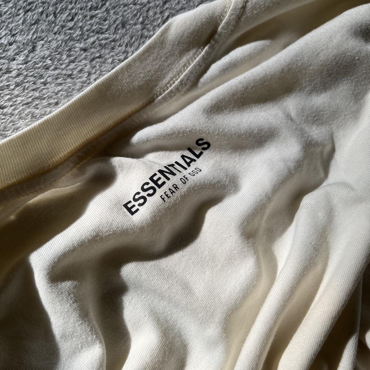 essentials white t-shirt (looks like a cream... - Depop