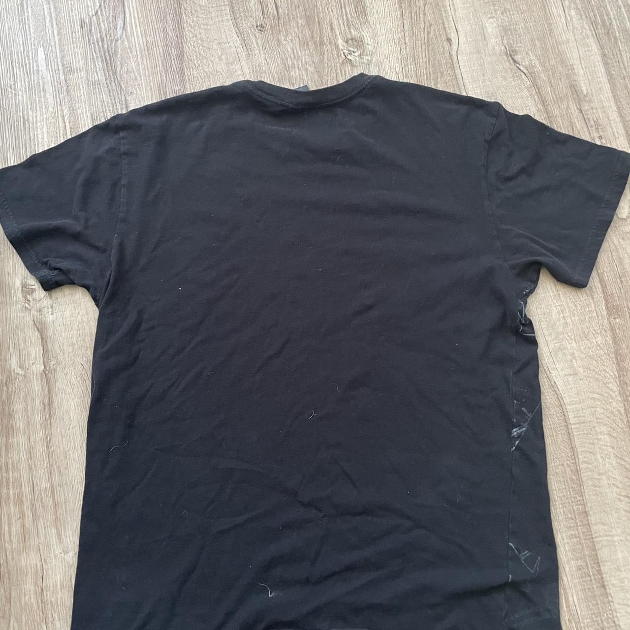 Oakley Men's Black and Grey T-shirt | Depop