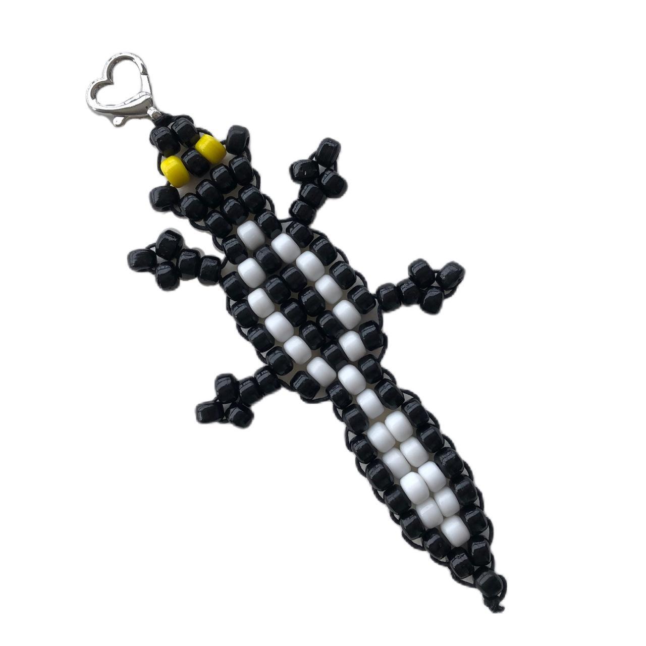 Large skunk 🦨 Glass beaded keychain Cotton... - Depop