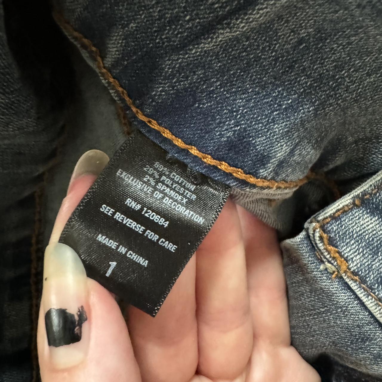 Hot Topic Y2k flare jeans with star patches -... - Depop