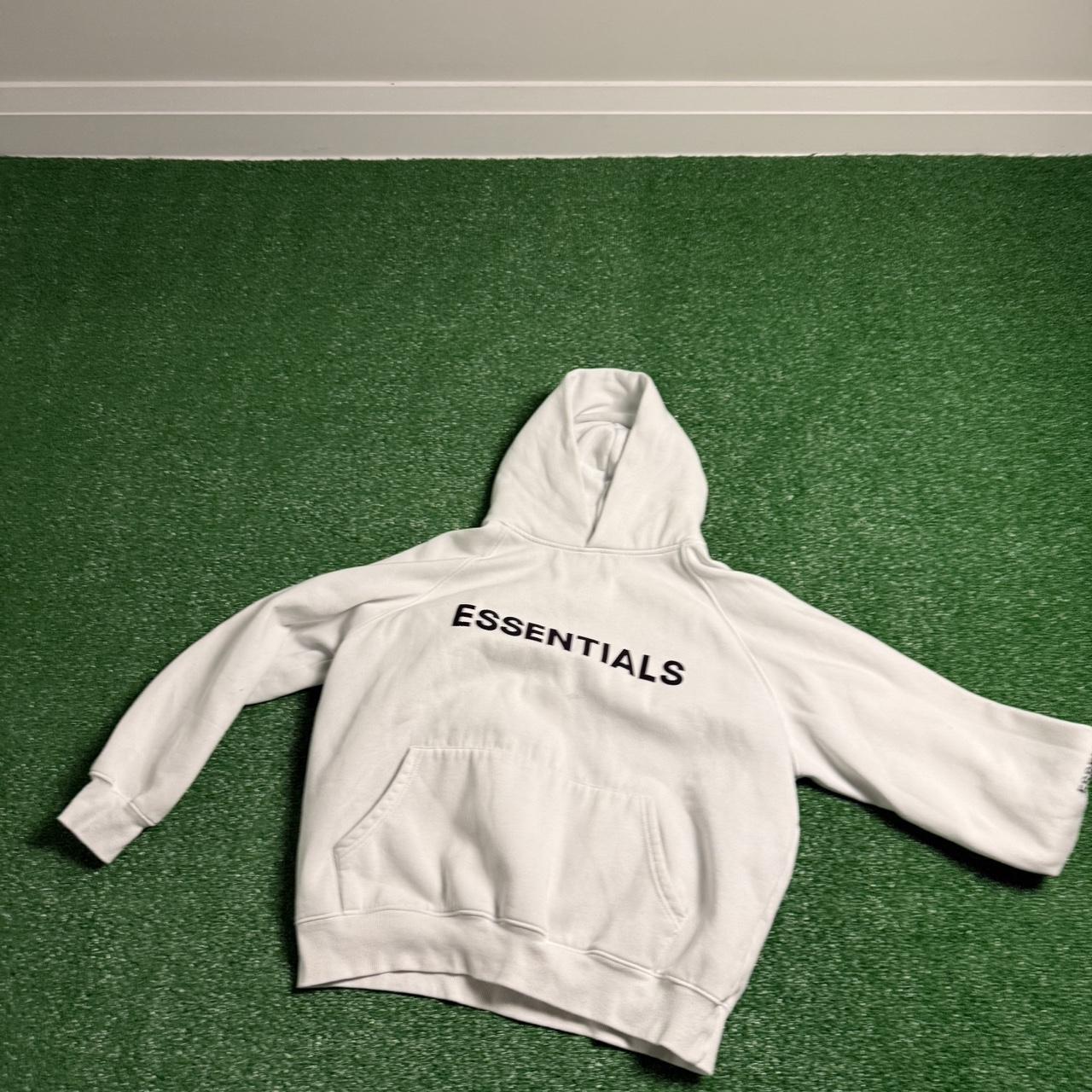 White Essentials hoodie Logo is Embossed, not... | Depop