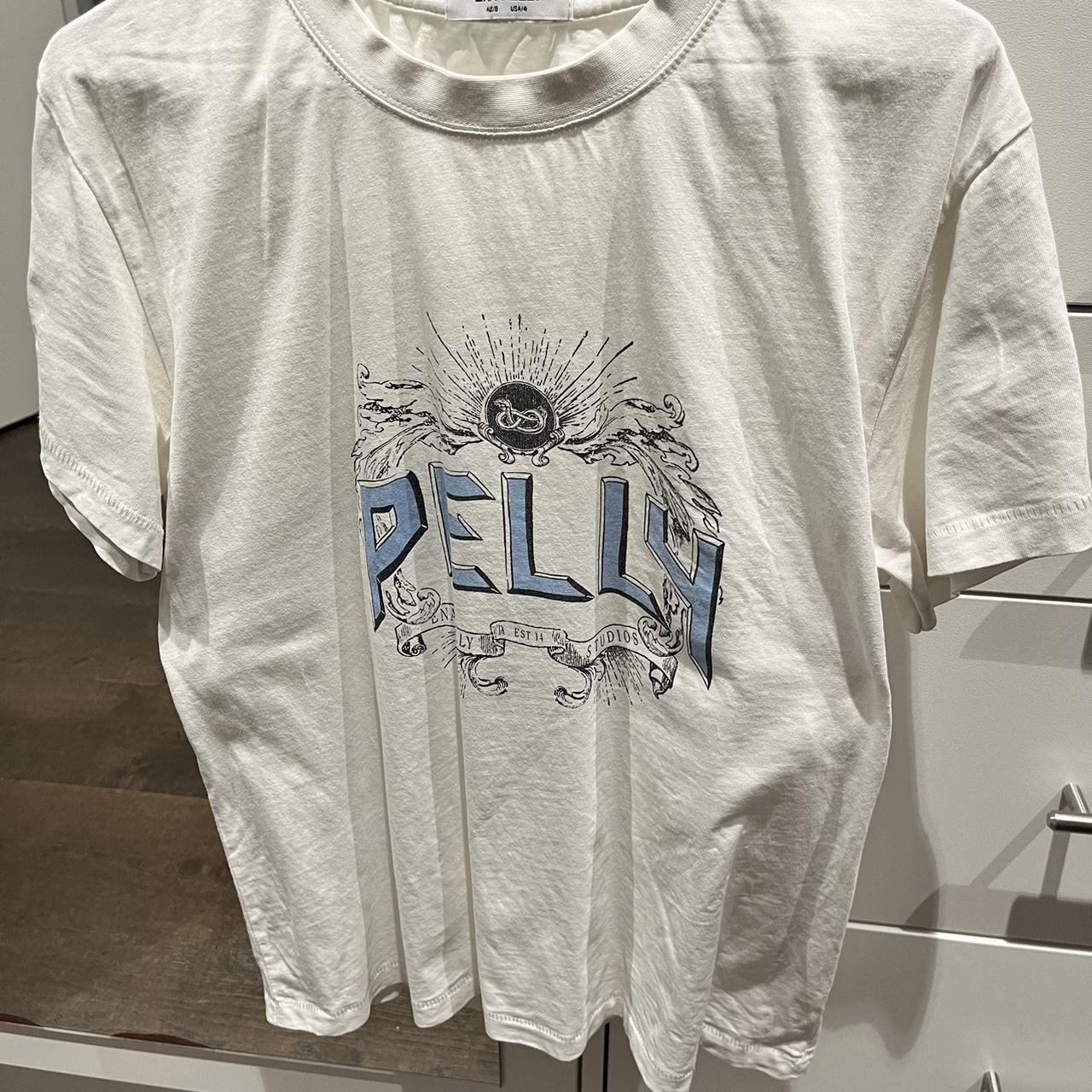 White ena pelly T-shirt in good condition size 8 - Depop