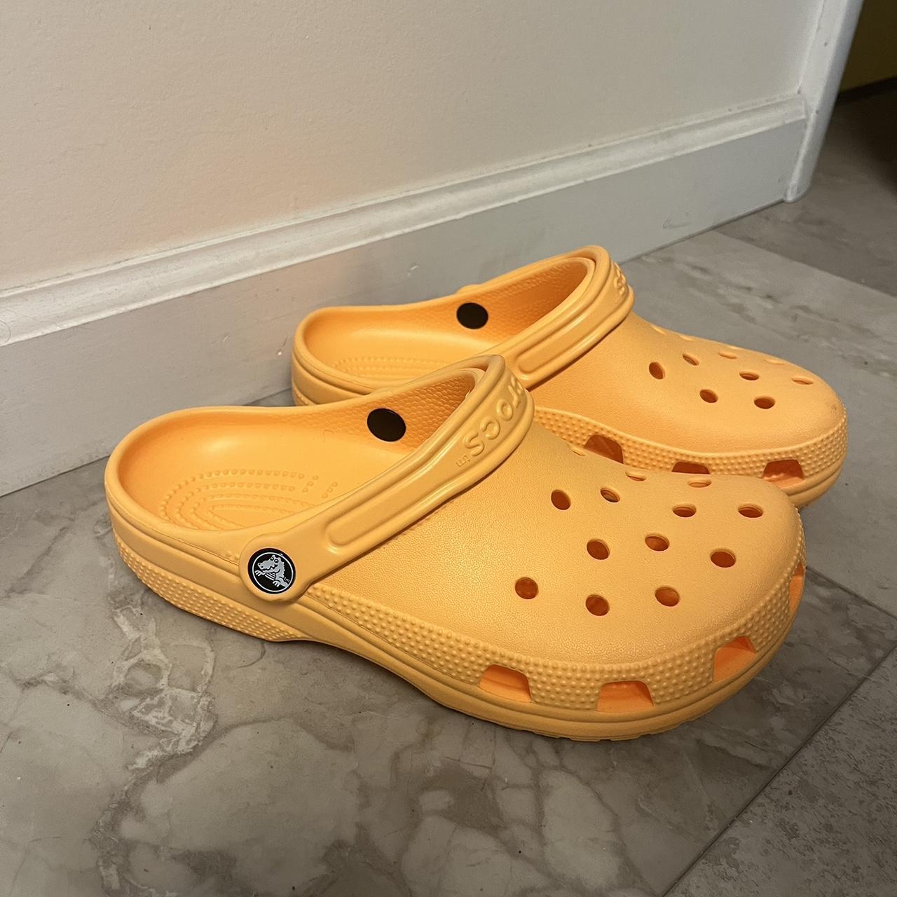 Creamsicle colored crocs, worn only a couple... - Depop