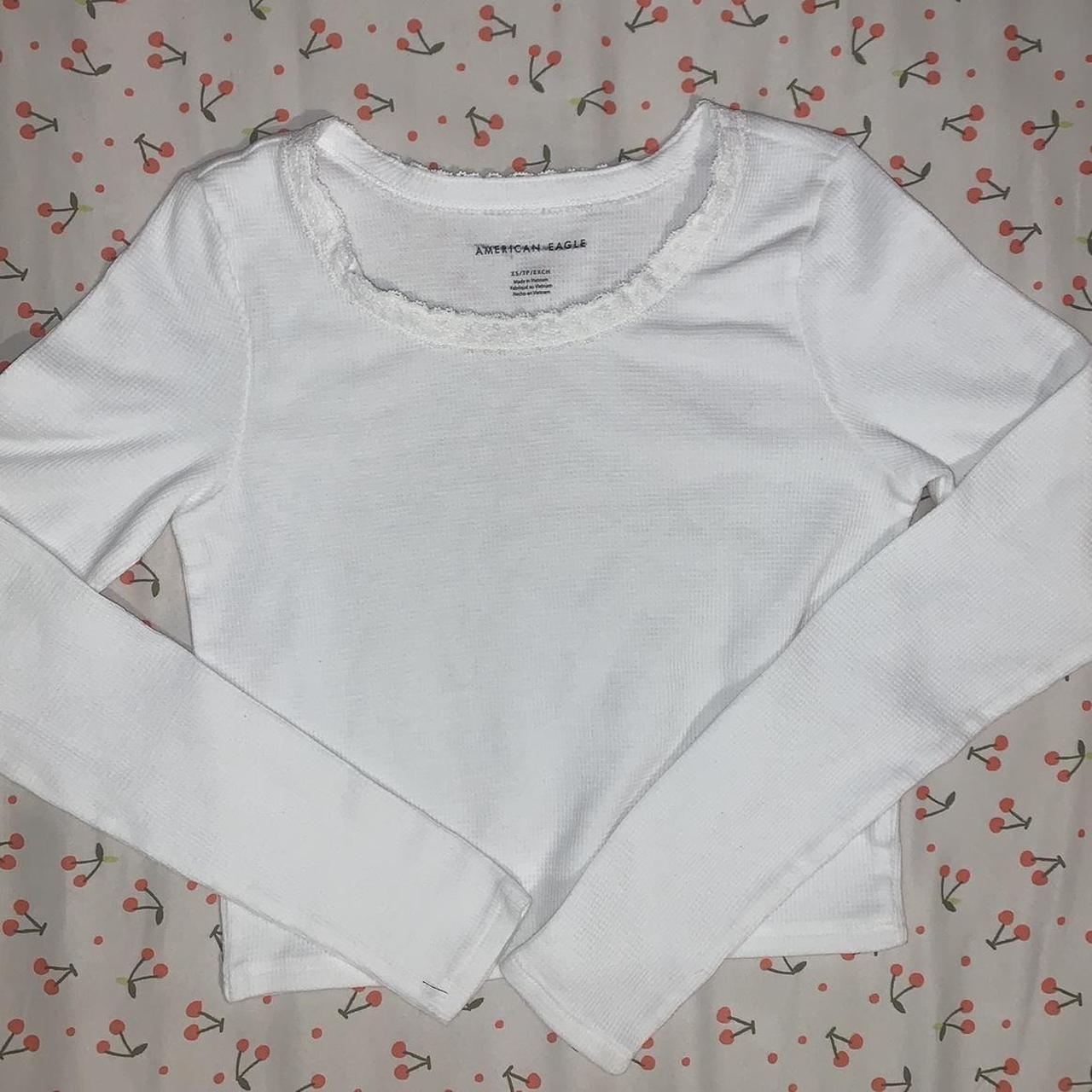 American Eagle white cropped long sleeve with a lace... - Depop