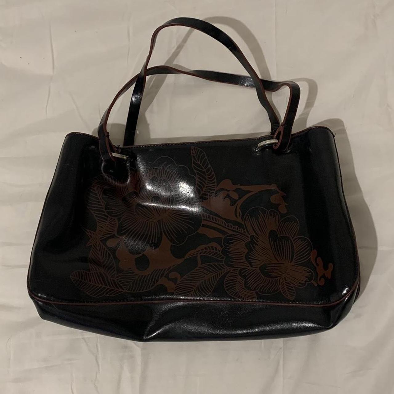 Brown pleather bag with a lighter brown flower... - Depop