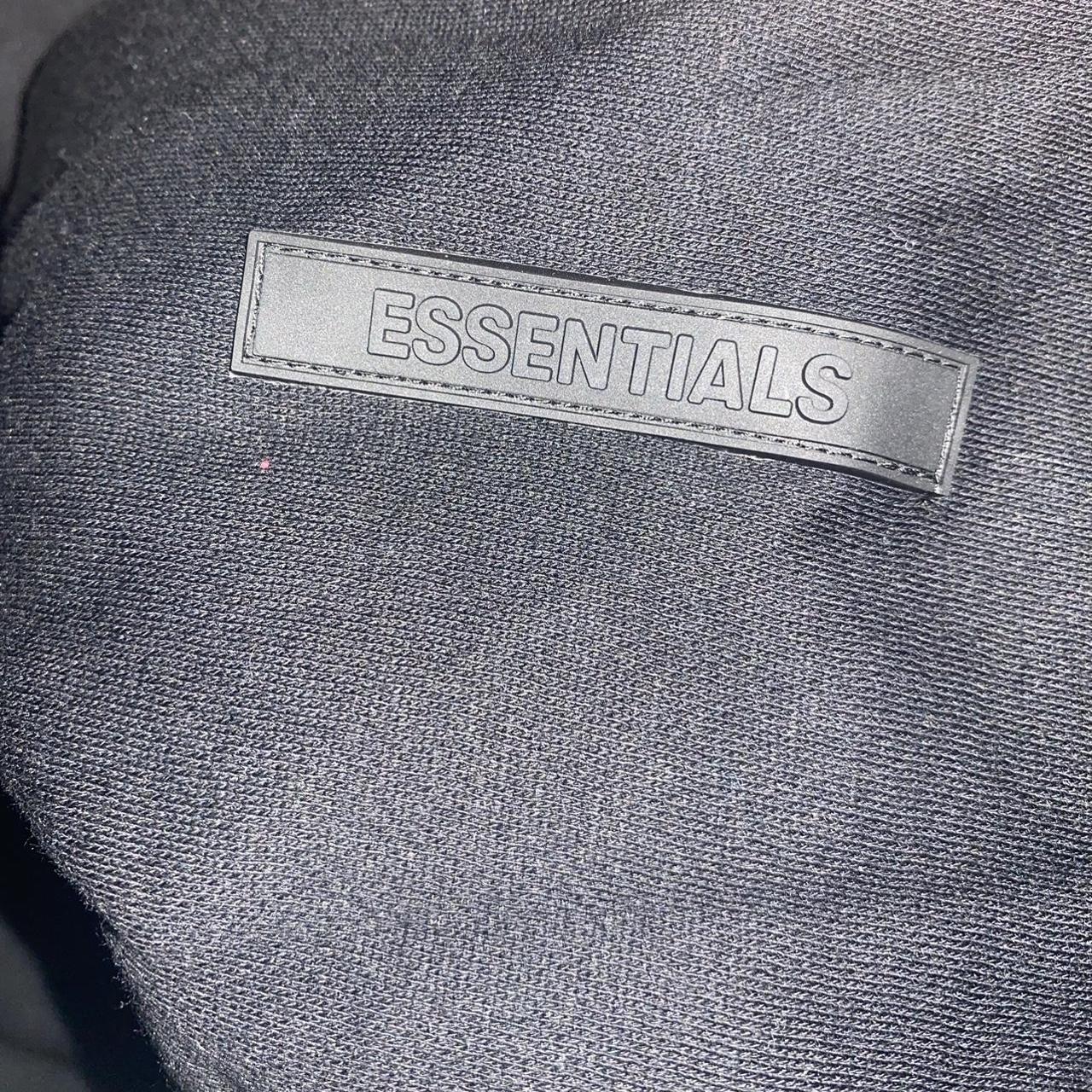 black essentials fear of god hoodie #essentials... - Depop