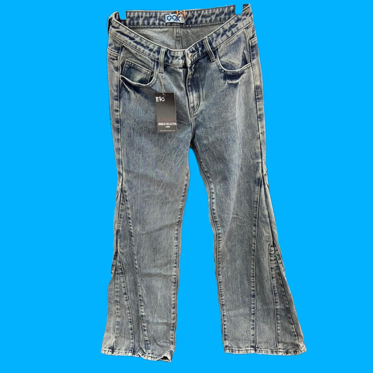 Grey super flare panel jeans with original left leg... - Depop