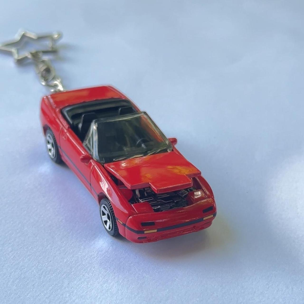 Y2K Mazda RX7 keychain -moving parts series which is... - Depop