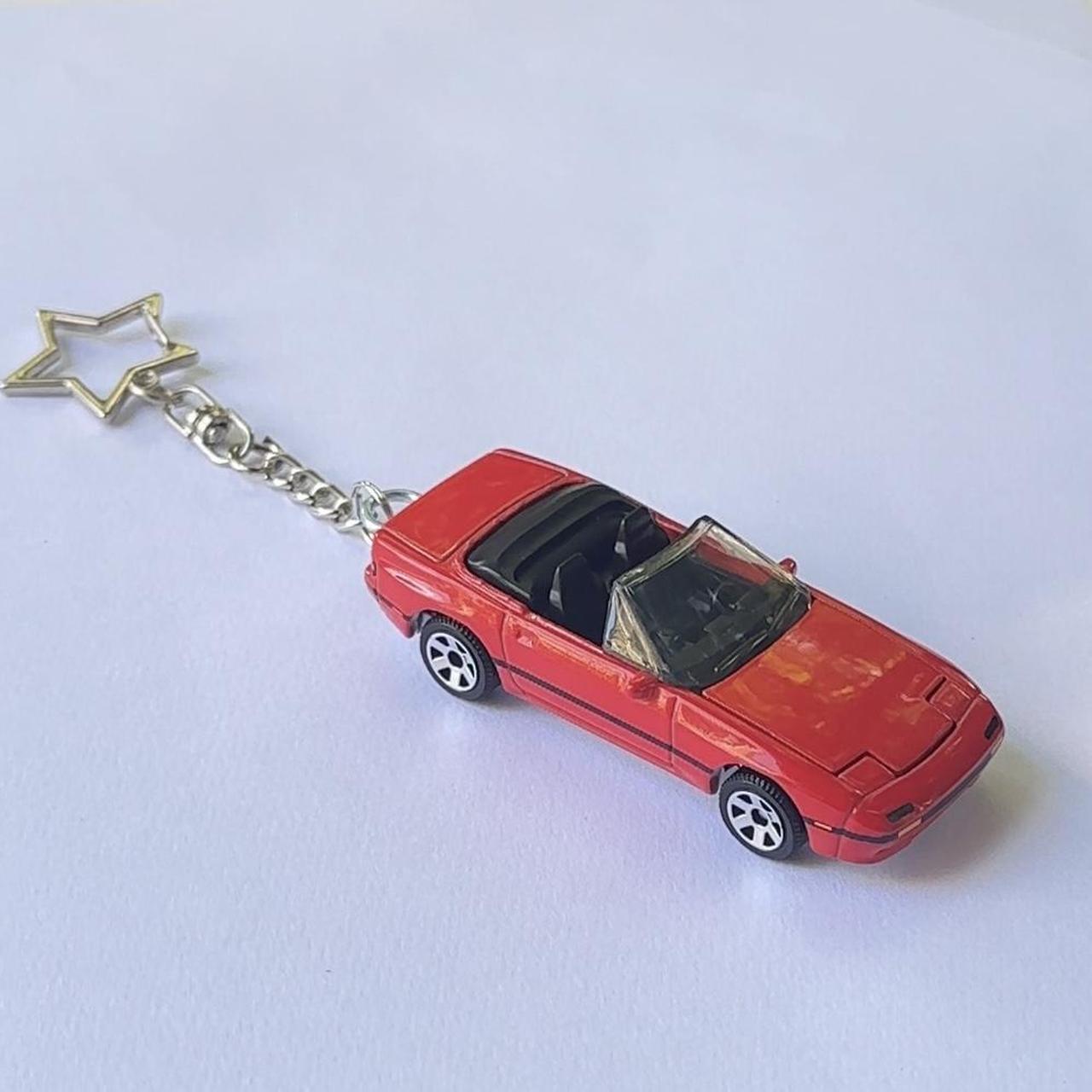 Y2K Mazda RX7 keychain -moving parts series which is... - Depop