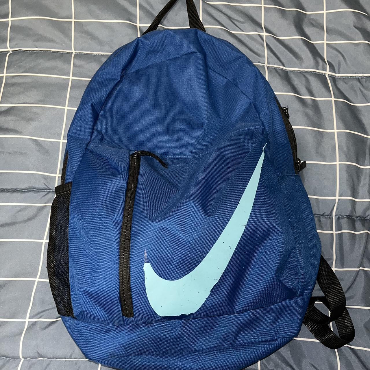 Blue nike backpack. One small pocket in the front,... - Depop