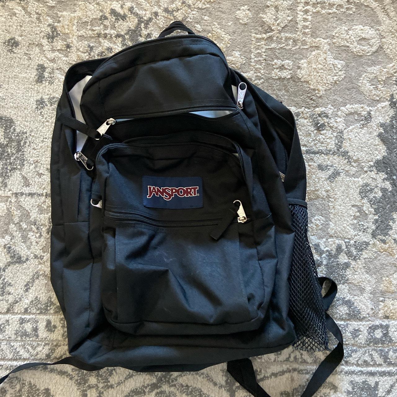 black jansport backpack has a rip in the side... - Depop