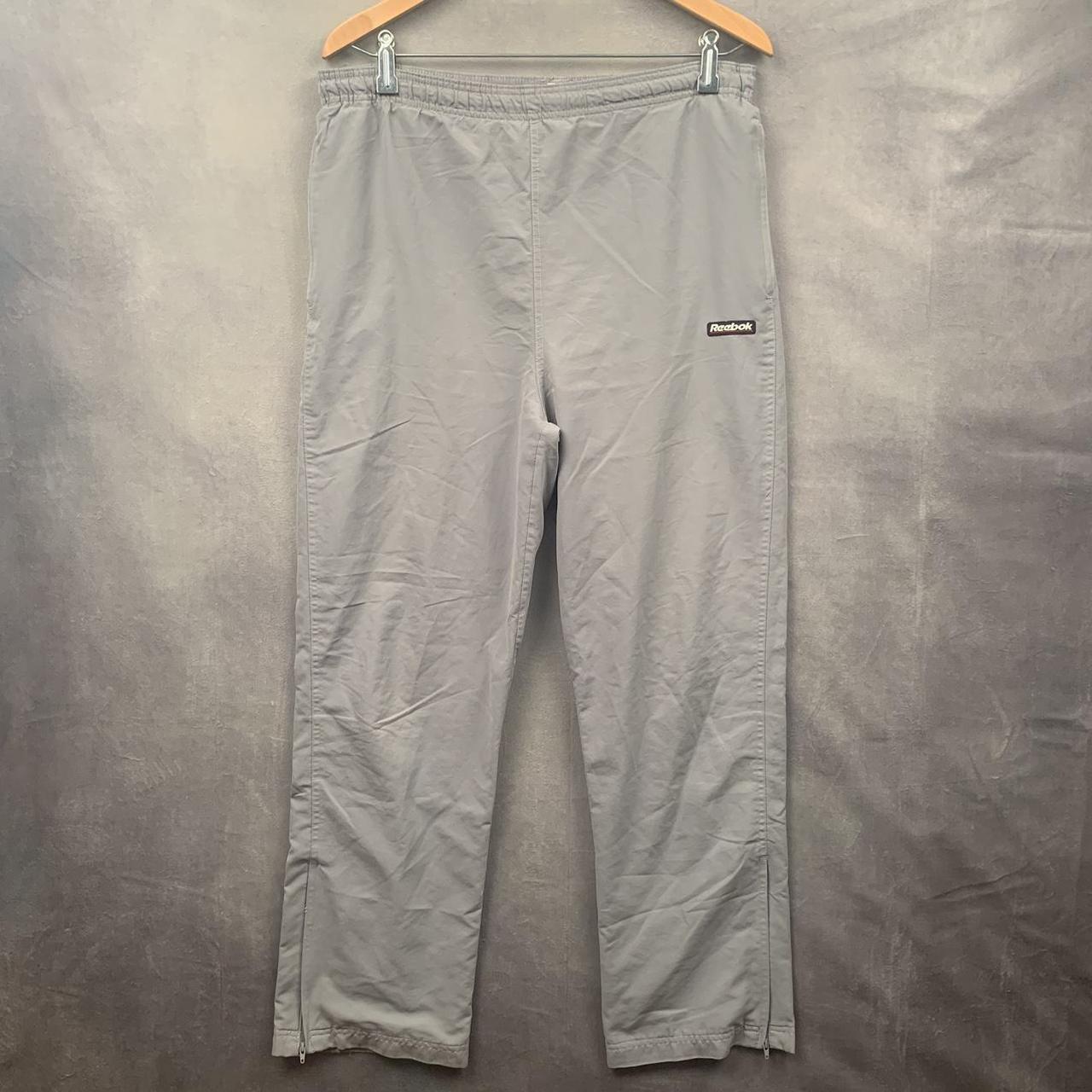 Reebok vintage track pants, grey men’s small - Depop