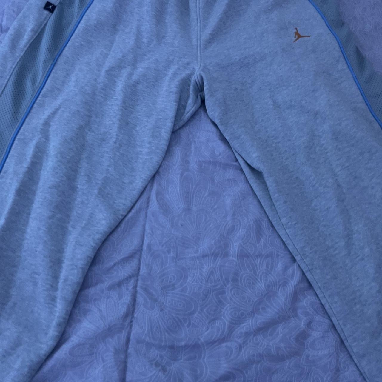 Grey and blue vintage 2000 Jordan sweatpants with... - Depop