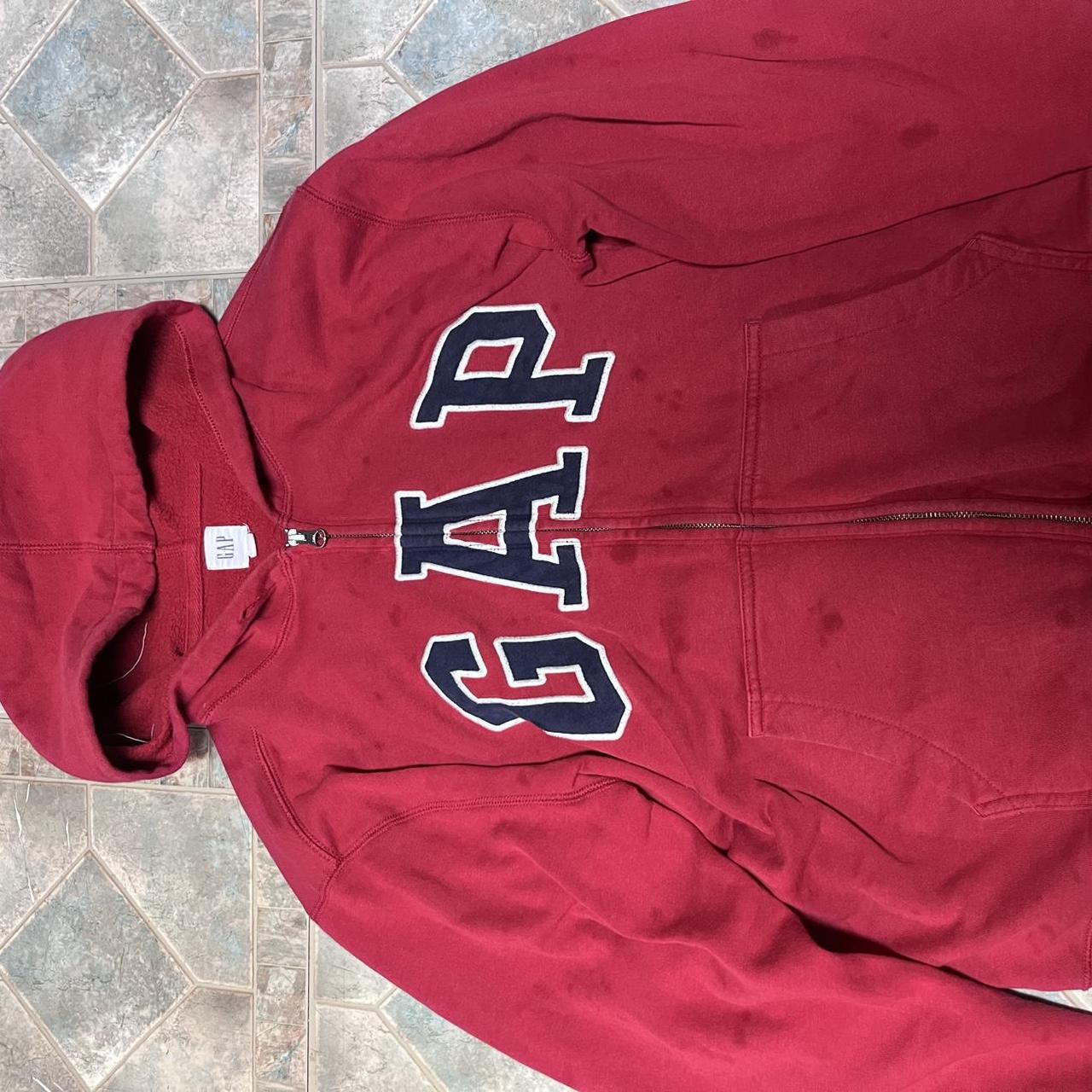 red gap hoodie with stains size M - Depop