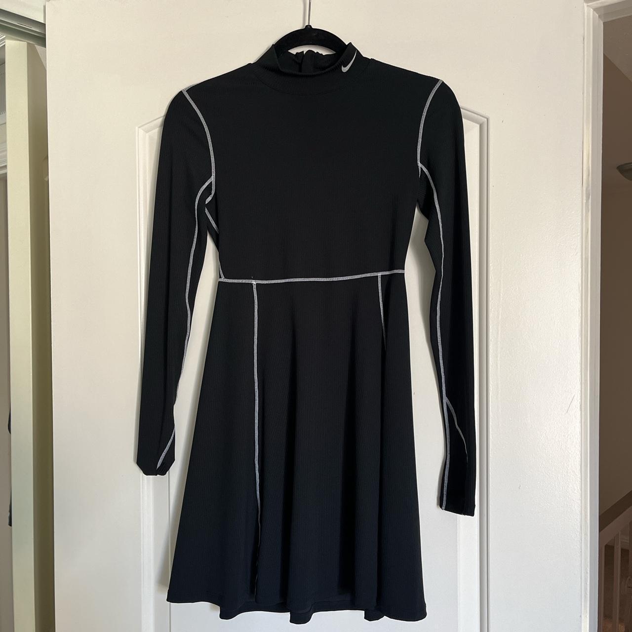 Nike form fitting mini dress with back zipper... - Depop