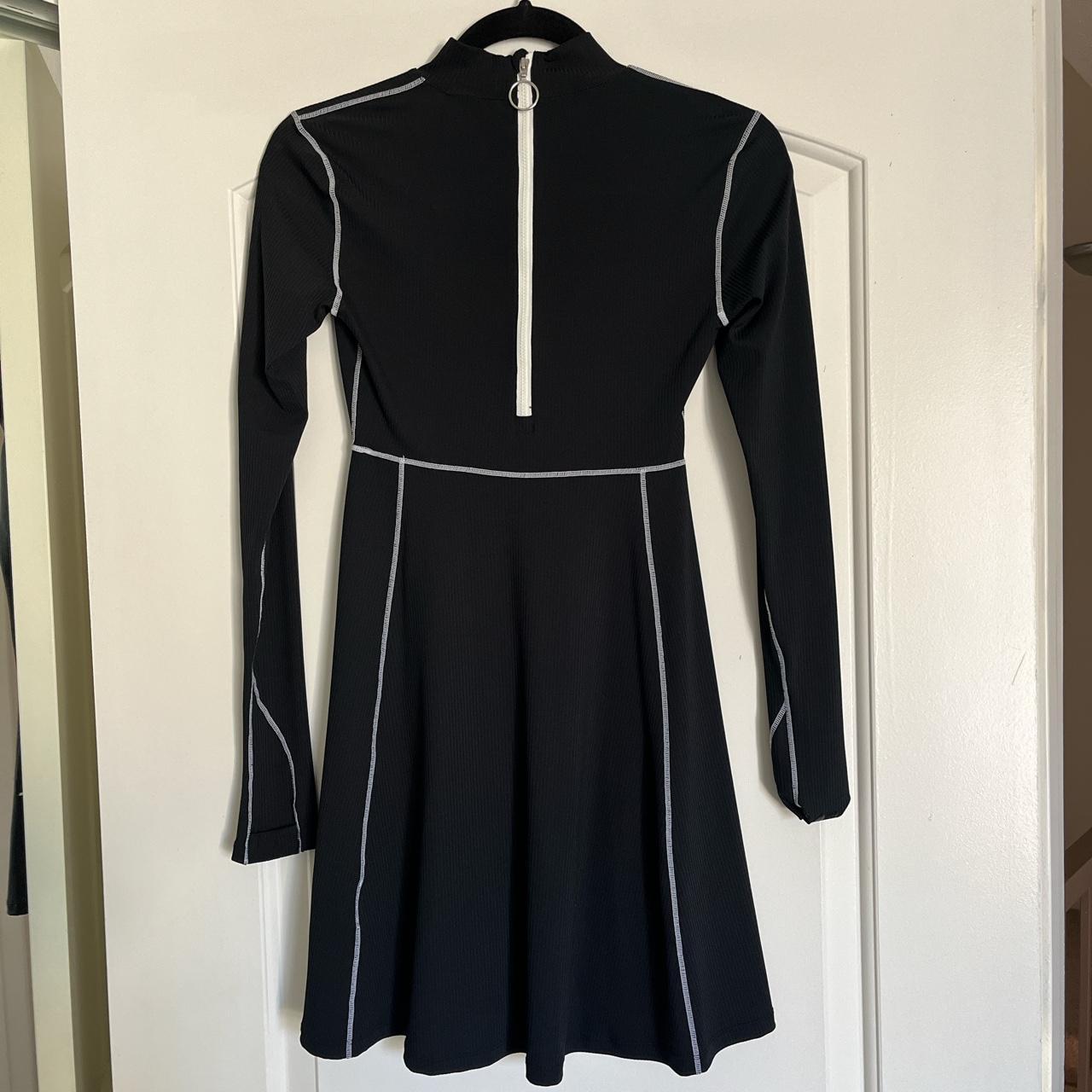 Nike form fitting mini dress with back zipper... - Depop