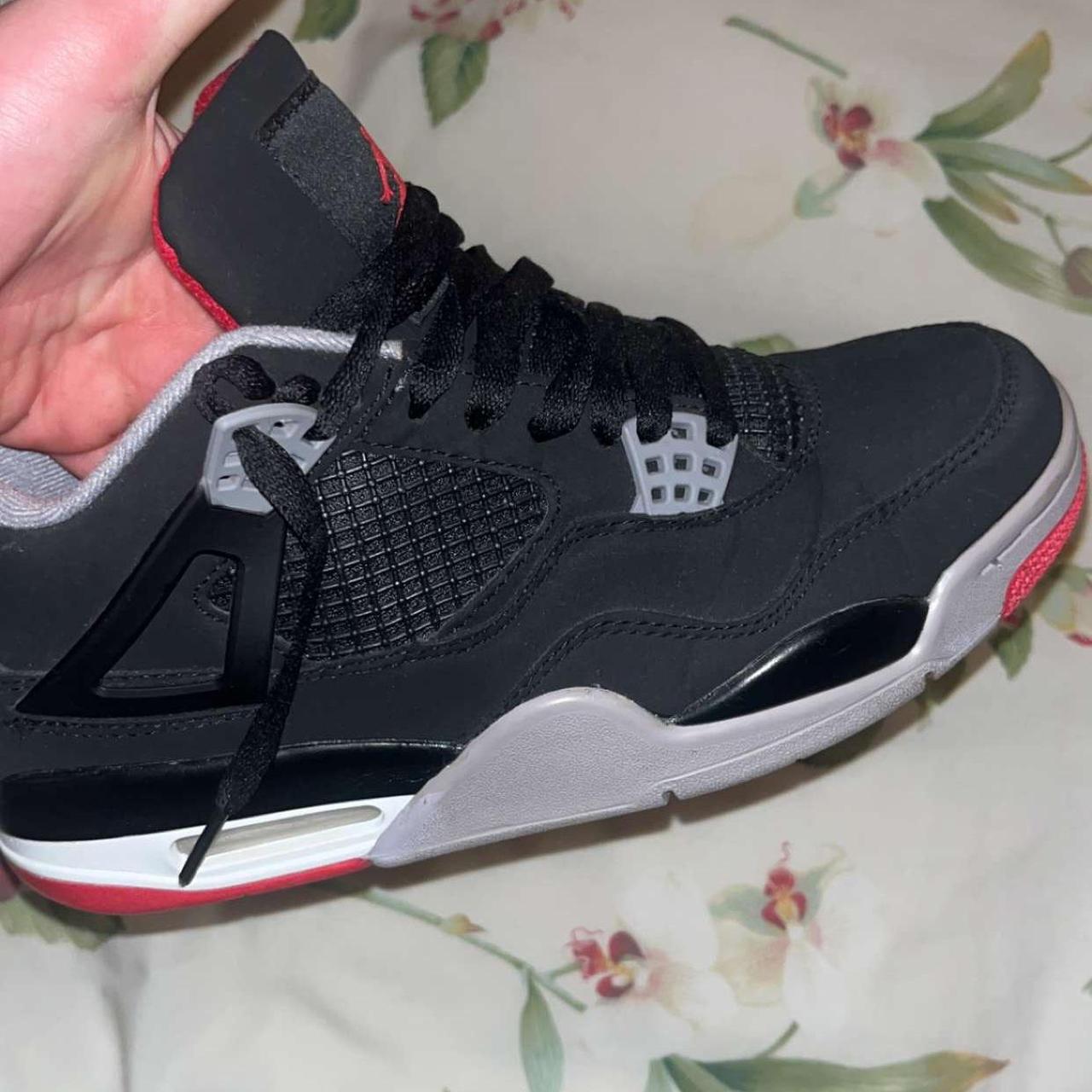 Black Jordan 4s - Depop