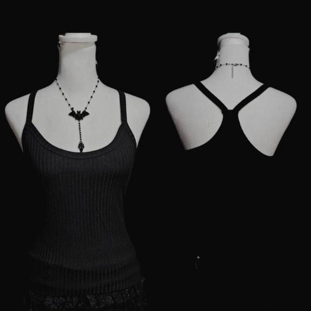 Black gothy tank with crossed back... I did lighten... | Depop