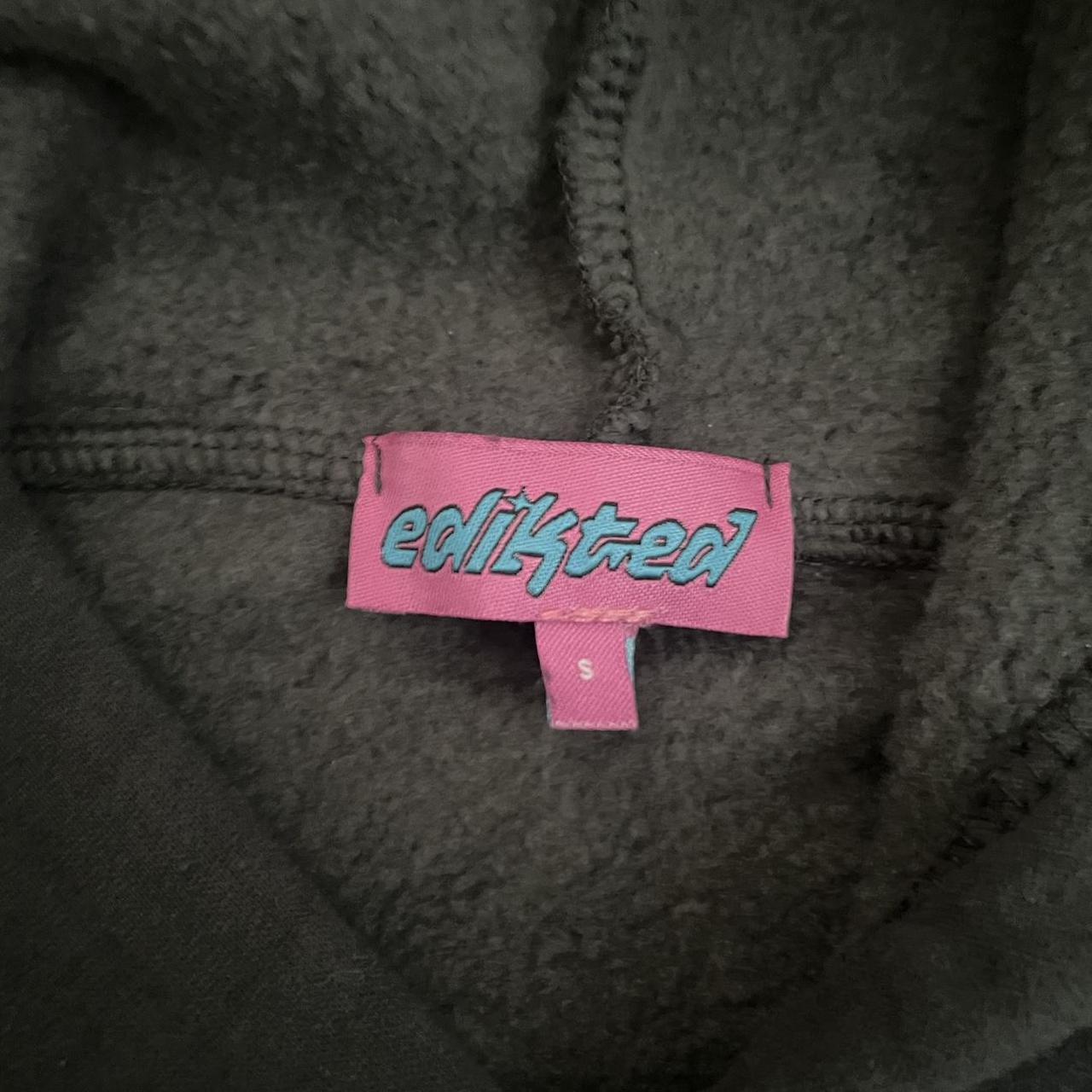 Edikted Grey hoodie with light pink bows on the back... - Depop