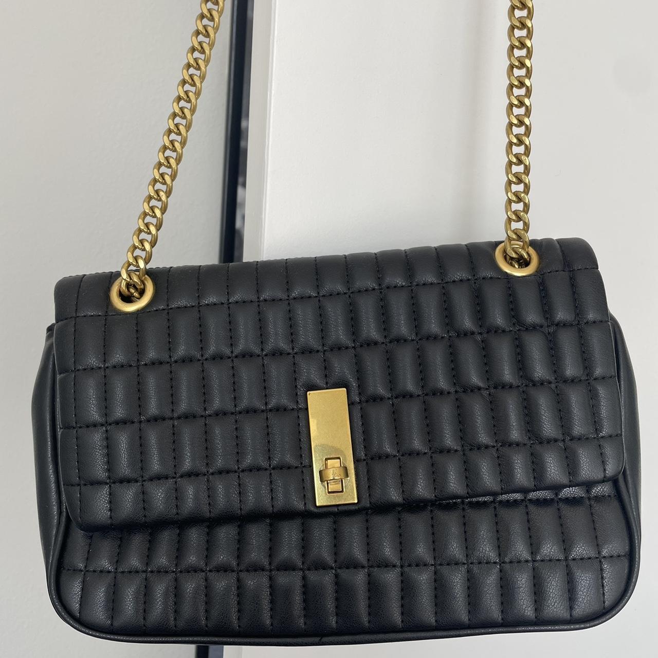 Black and gold Mango chain purse #Mango #purse... - Depop