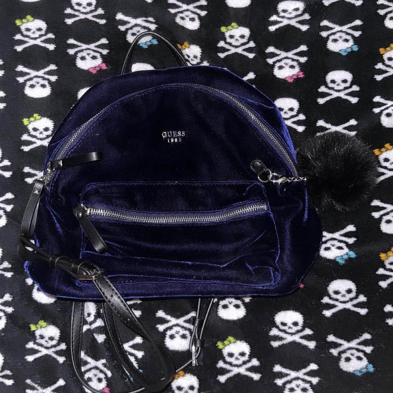 Dark blue backpack with fluffy ball keychain💙 No... - Depop