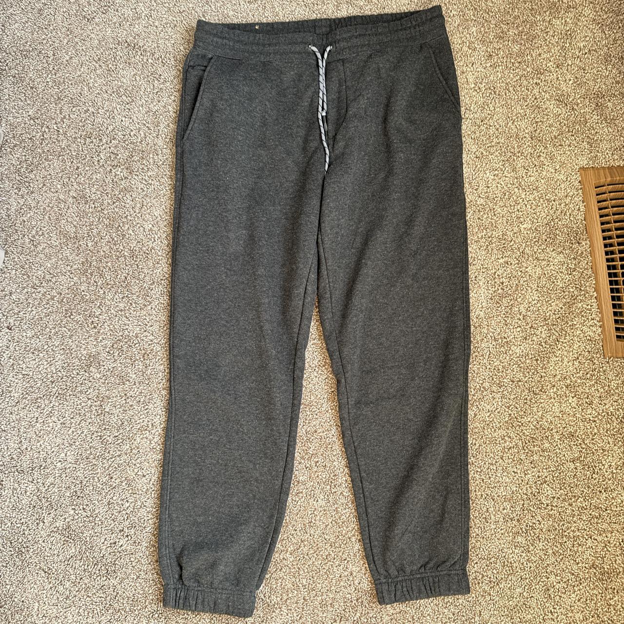 Grey tapered sweatpants with adjustable waistband... | Depop