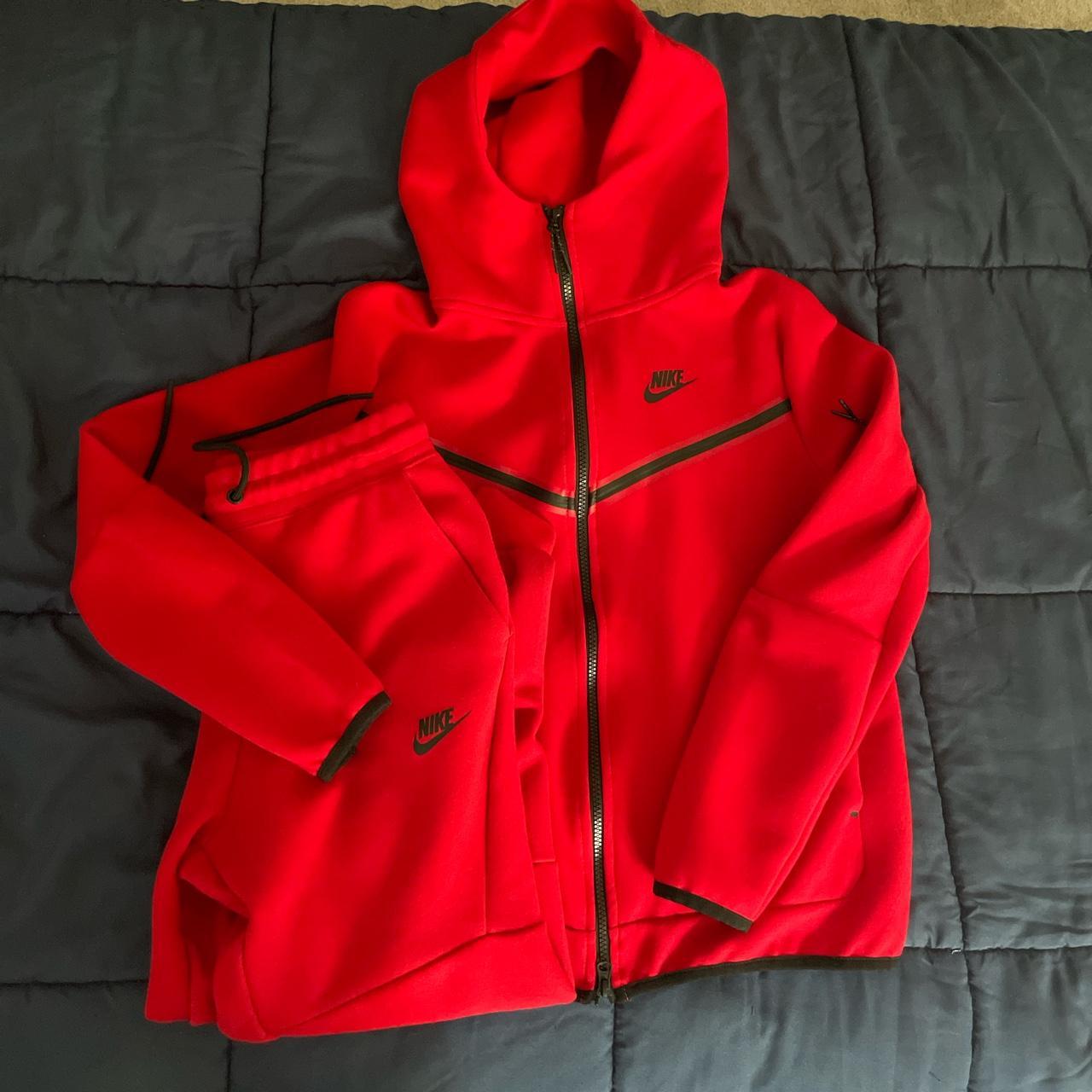 Red Nike tech fleece youth boys large - Depop