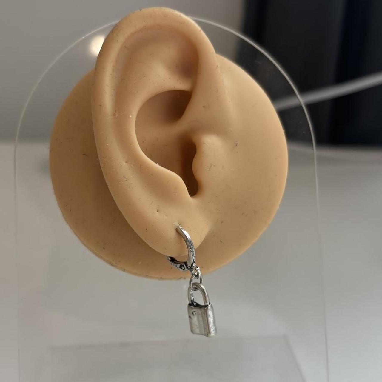 BRAND NEW pair of silver grunge huggie hoop lock... - Depop