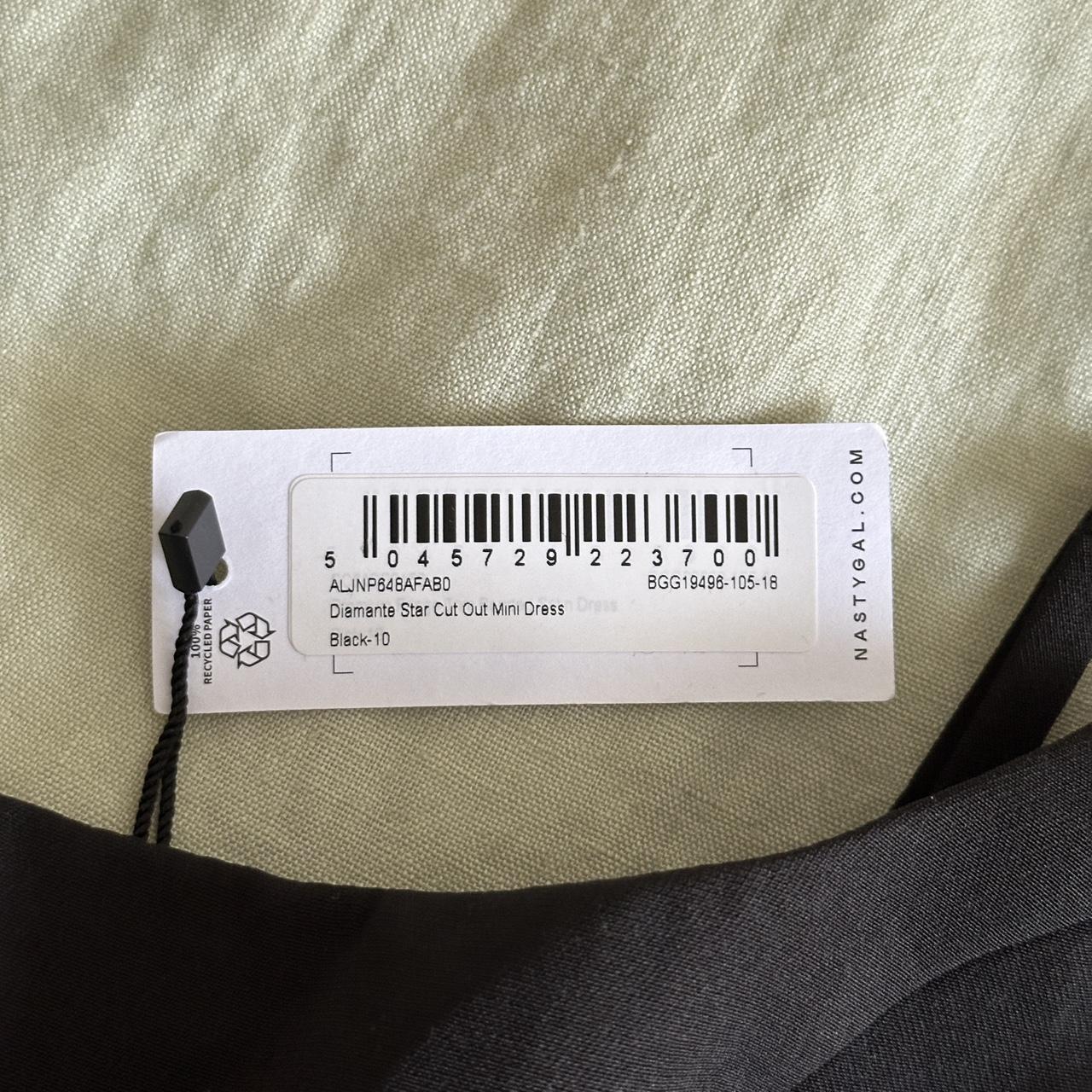 Black mini dress with diamond star cutouts Size... - Depop
