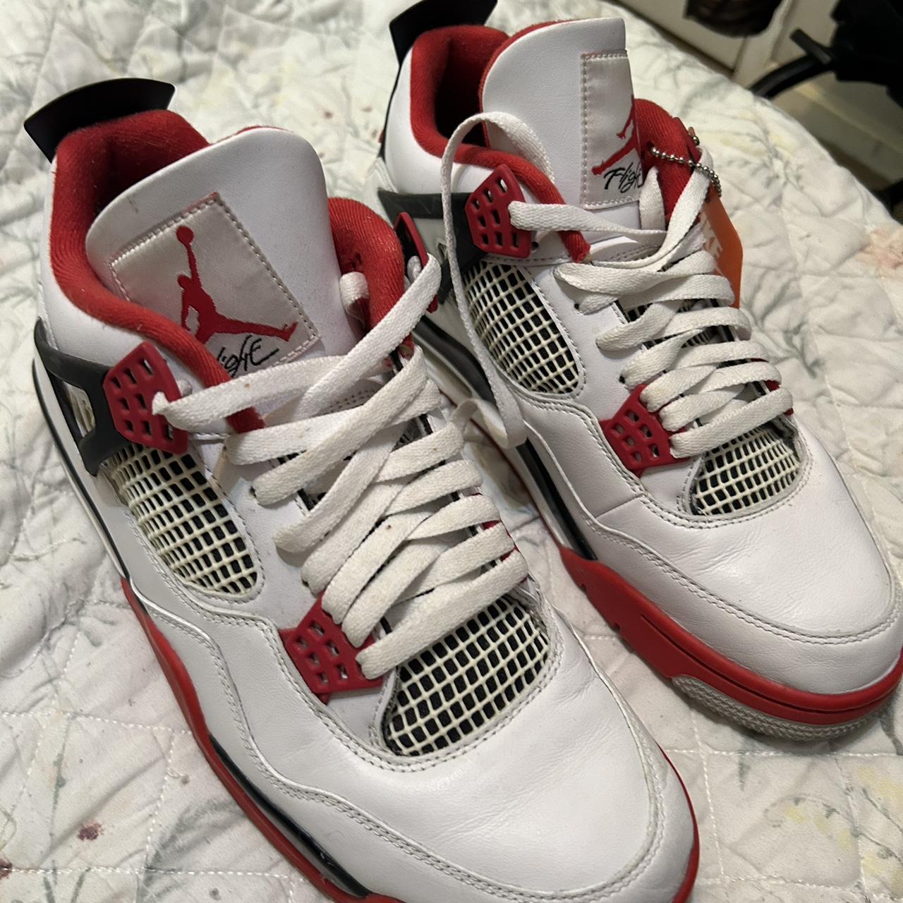 Fired red jordan 4s - Depop