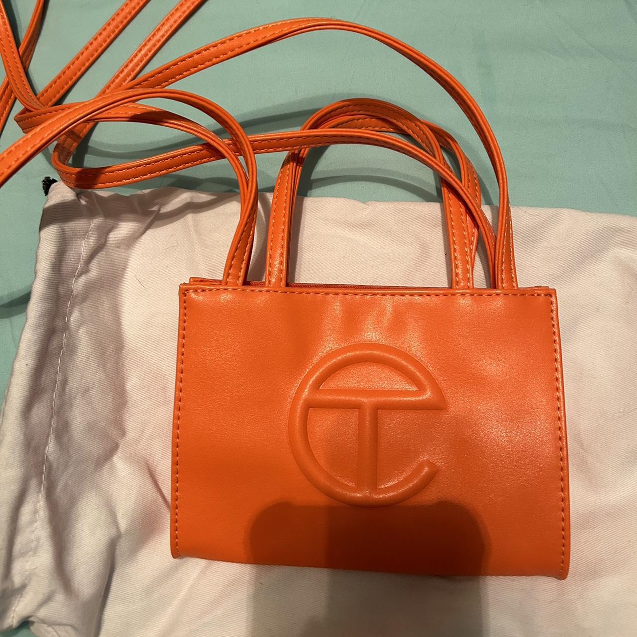 Small Orange Telfar for sale! Comes with dust... - Depop