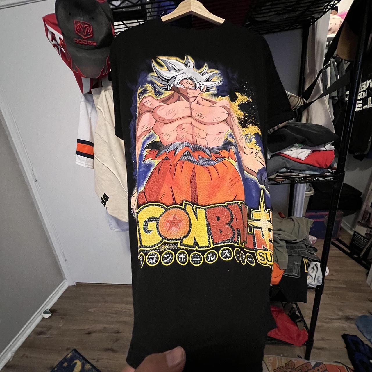 Dragon ball super UI Goku on a ripped tag - Depop