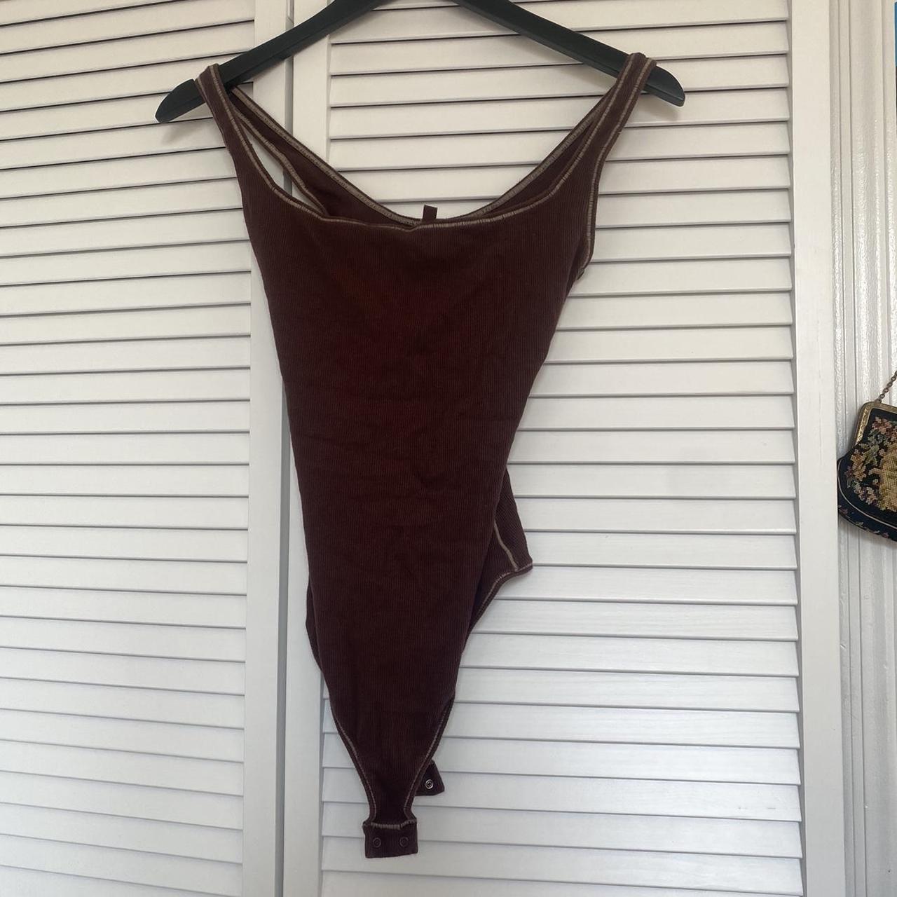 SKIMS brown body suit Fits a size small but it’s... - Depop