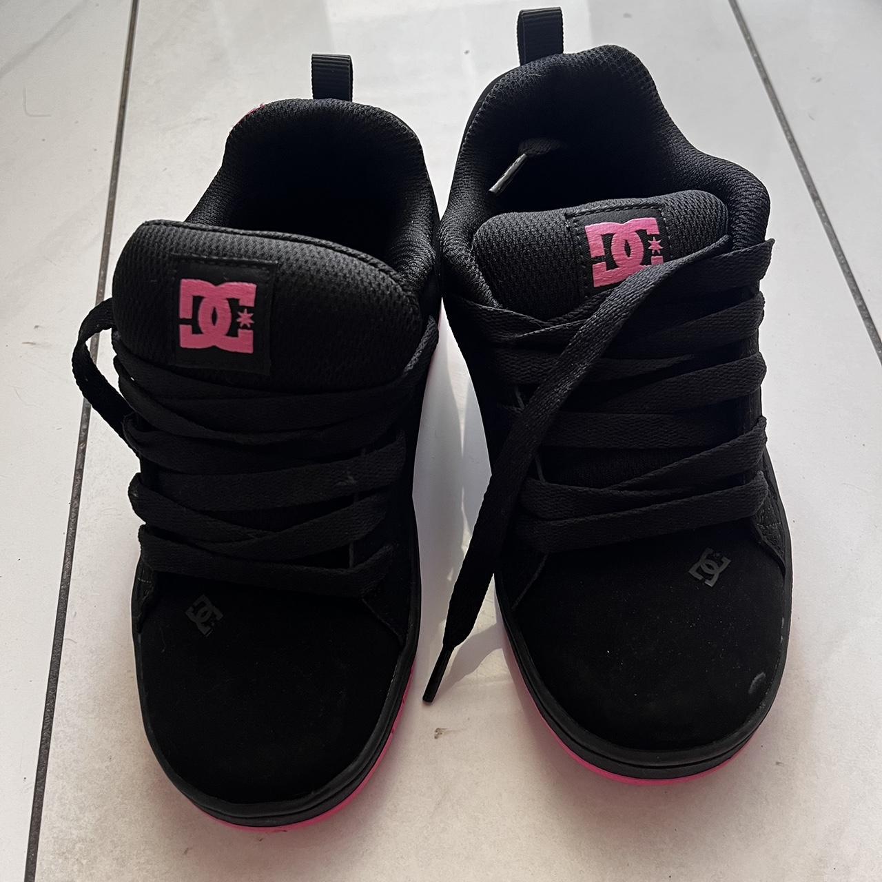 Pink and black DC shoes - Depop