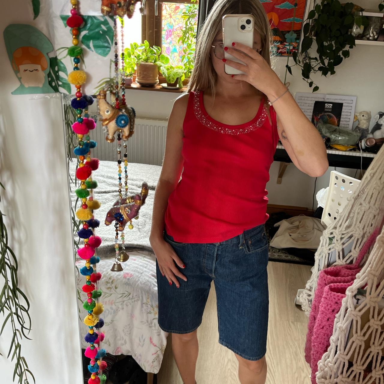 Vintage red ribbed vest top with beaded detailing on... - Depop