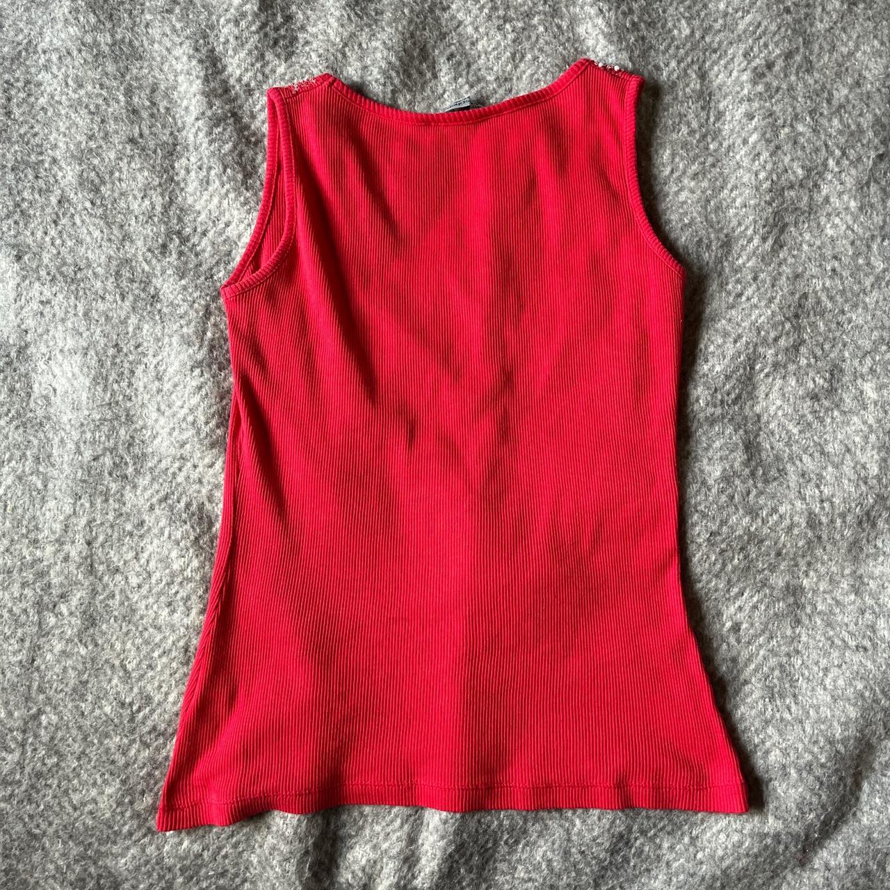 Vintage red ribbed vest top with beaded detailing on... - Depop