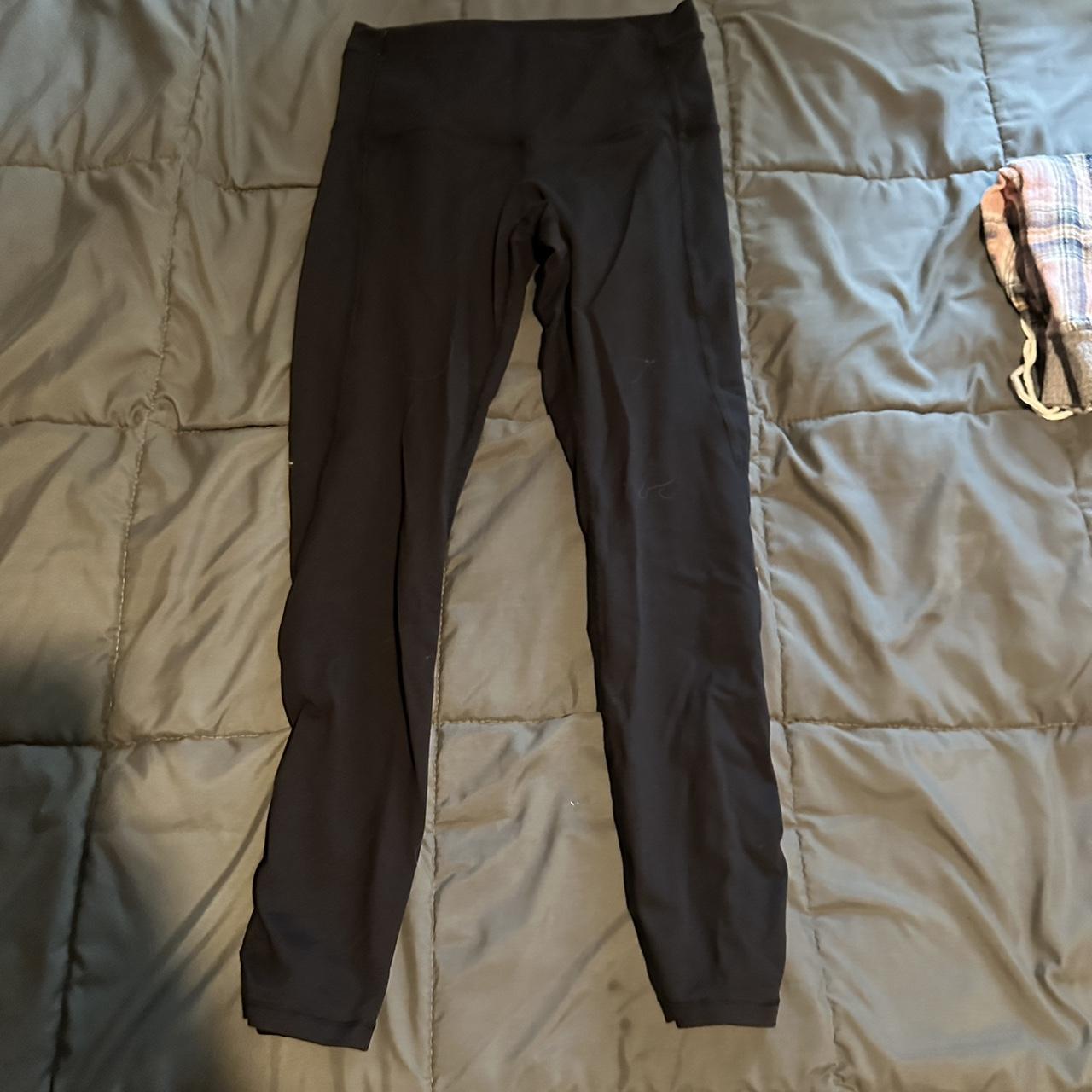 Black Lululemon leggings with cross pattern on calves - Depop