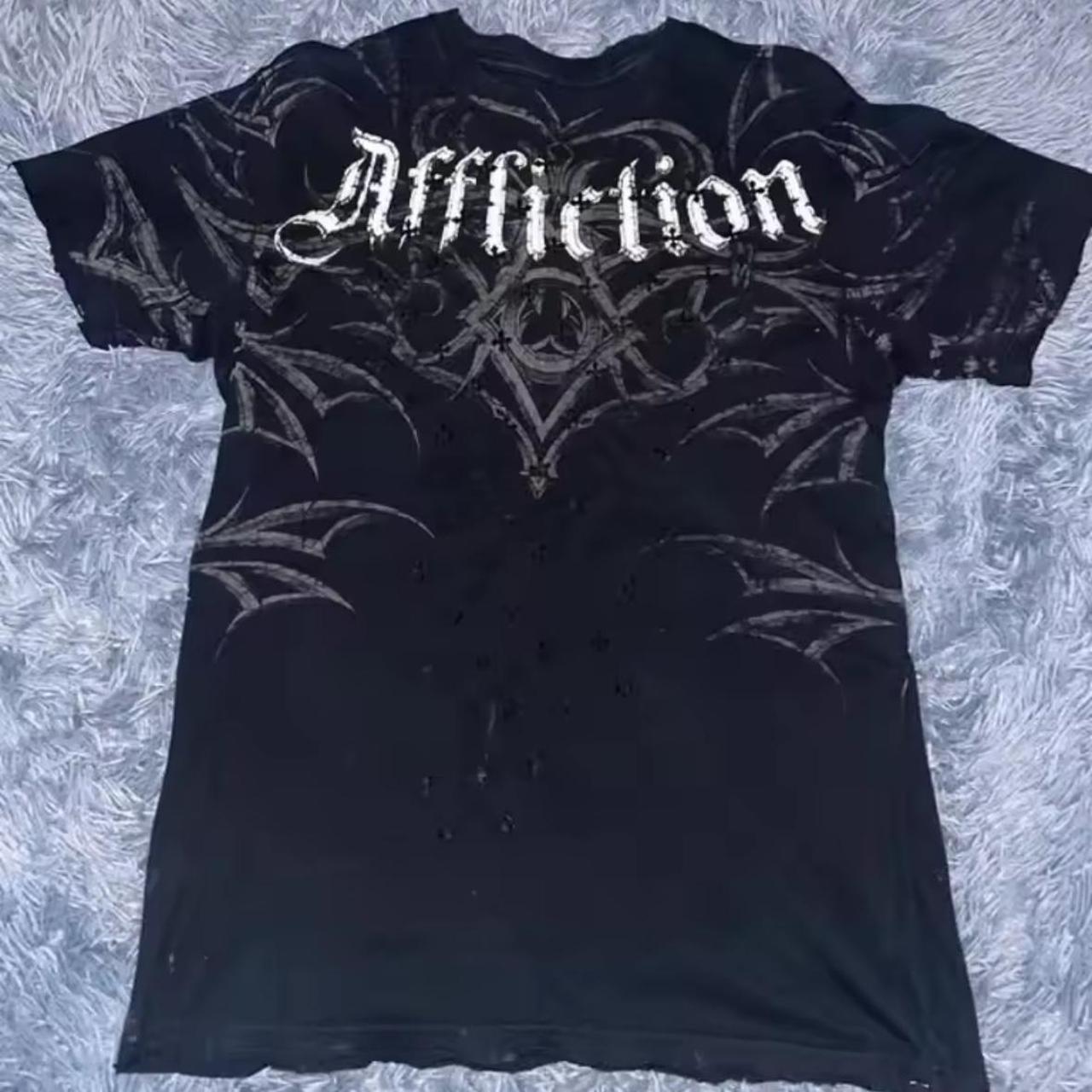 Black Affliction tee with white cross design Flaws... | Depop