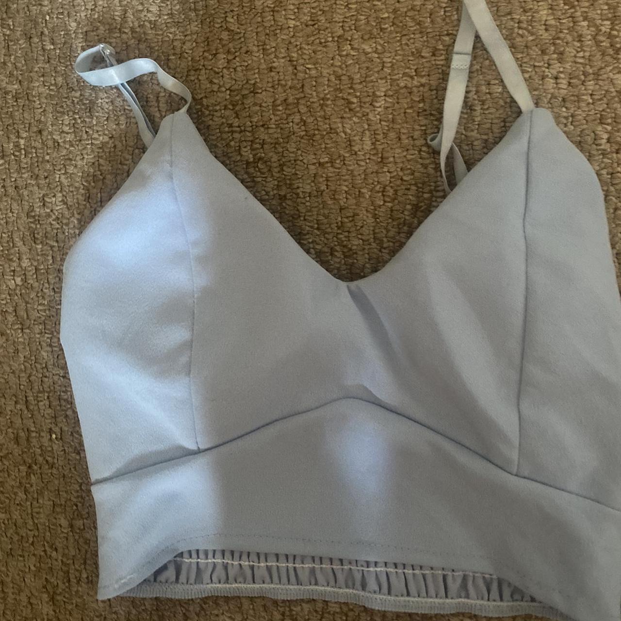 cropped padded baby blue cropped top with an elastic... - Depop