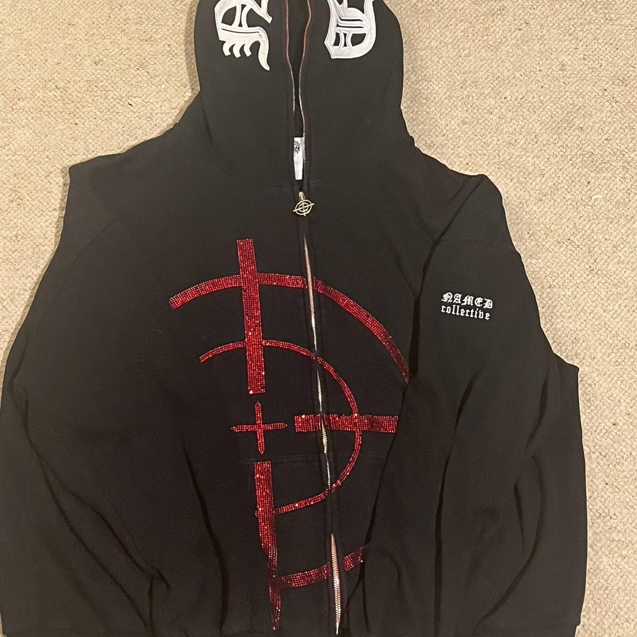 Named collective target hoodie black and red some... - Depop