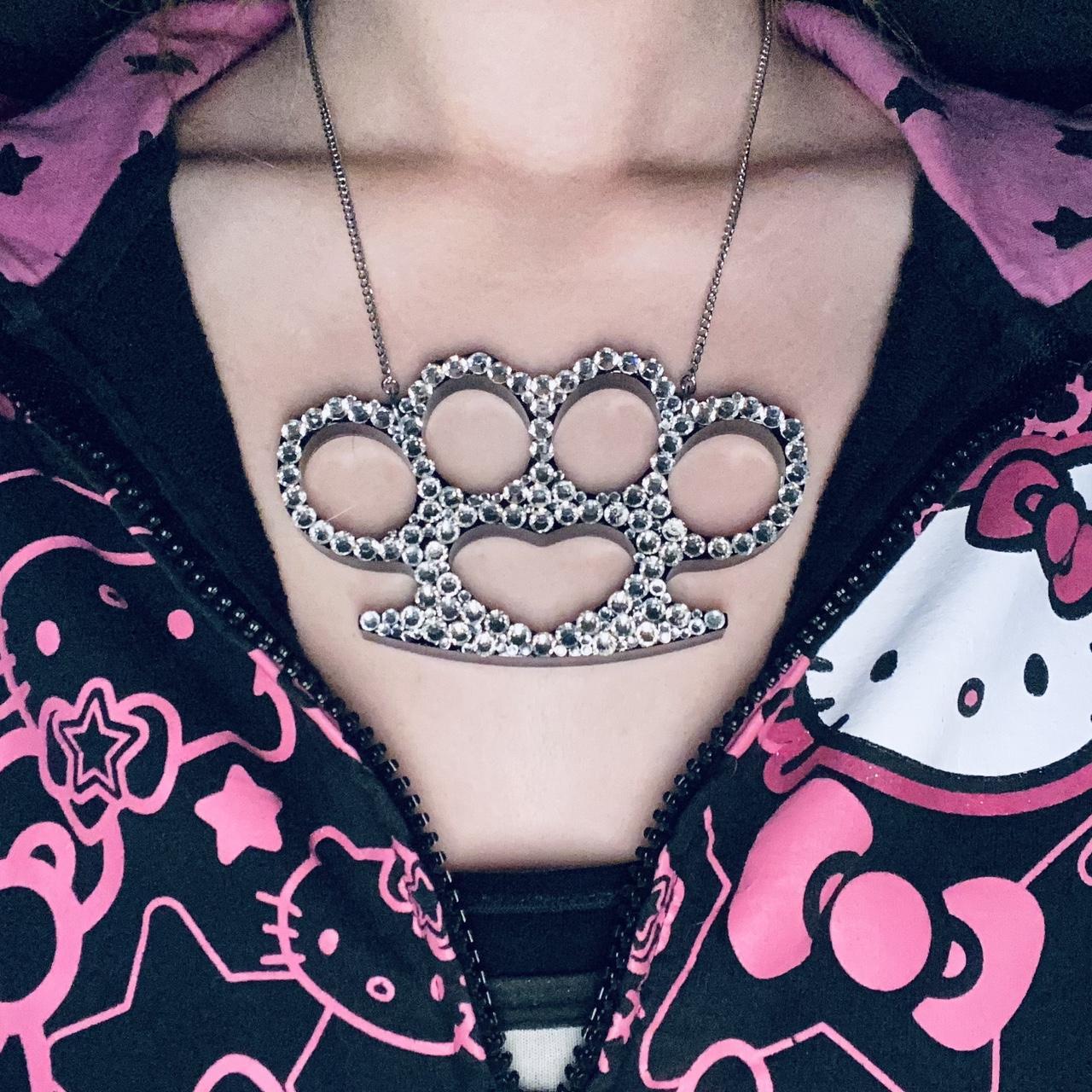 Custom color brass knuckle necklace! Glass... - Depop