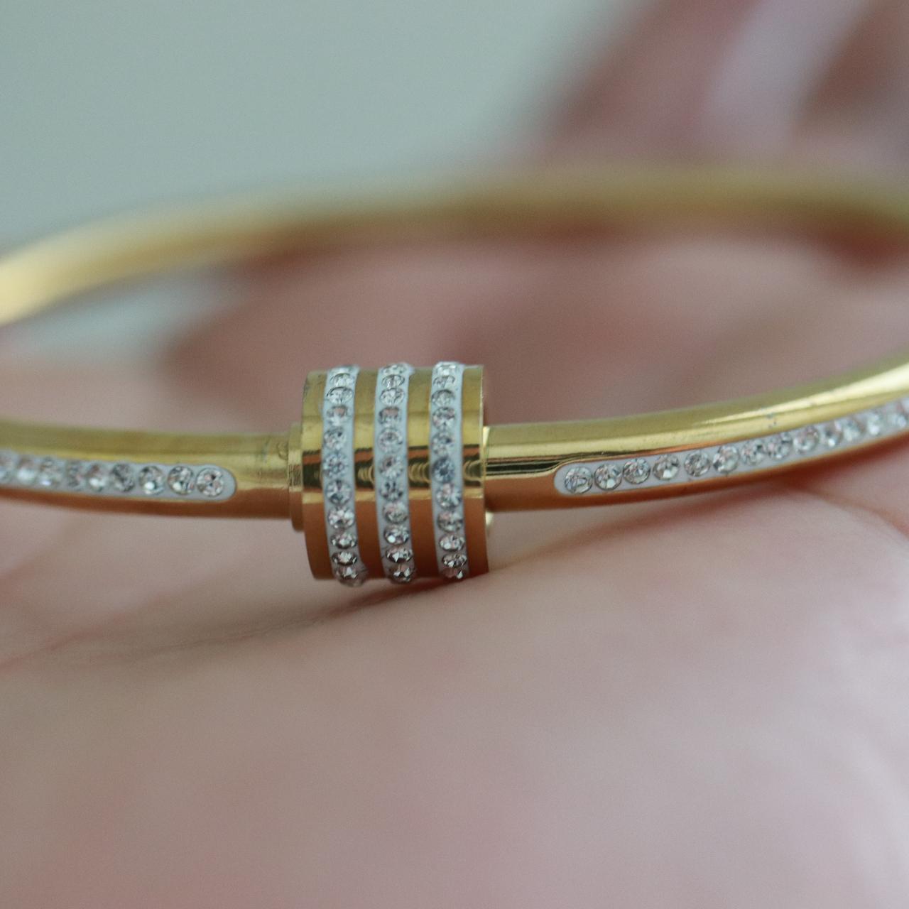 17cm Gold Plated Stainless Steel Lock Ring CZ Bangle... - Depop